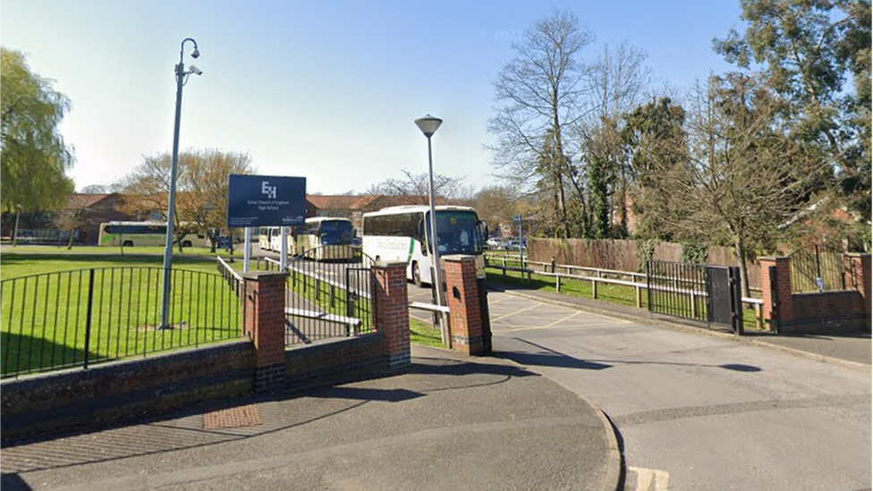 Esher: School lockdown lifted after armed police response - BBC News