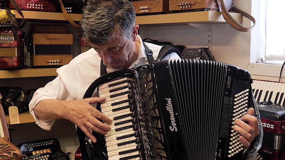 London: Allodi accordions used by Status Quo and Pogues to close its ...