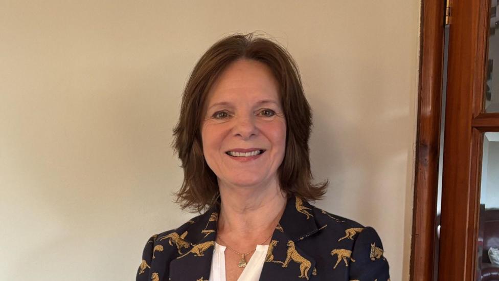 Keele University professor collects MBE from Windsor Castle - BBC News