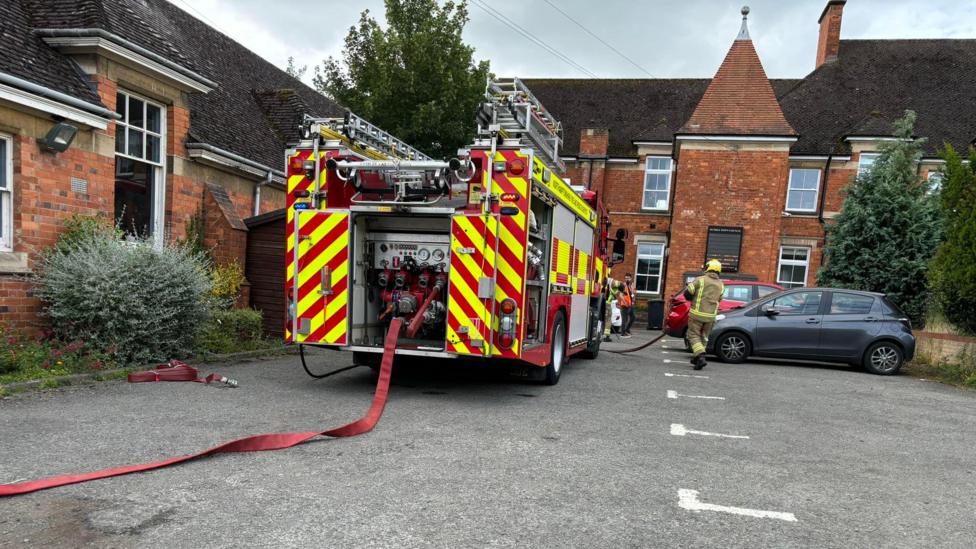 Firefighters tackle blaze in centre of Kettering - BBC News