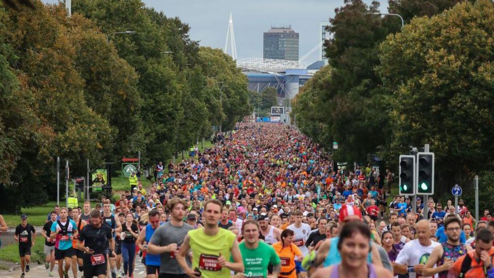 Record number to take part in Cardiff Half Marathon 2025 - BBC News