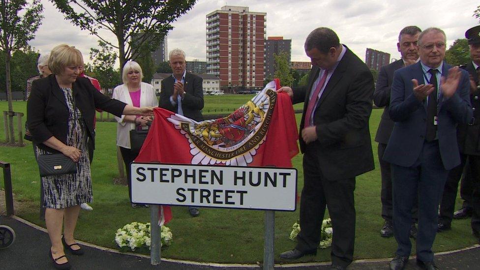 Street named after Manchester firefighter Stephen Hunt - BBC News