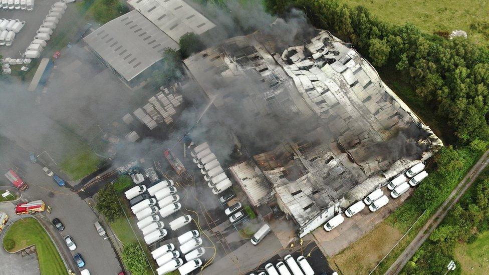 Burnley fire: Firefighters tackle blaze on industrial estate - BBC News