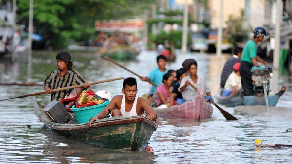 Myanmar asks for international aid to handle floods - BBC News