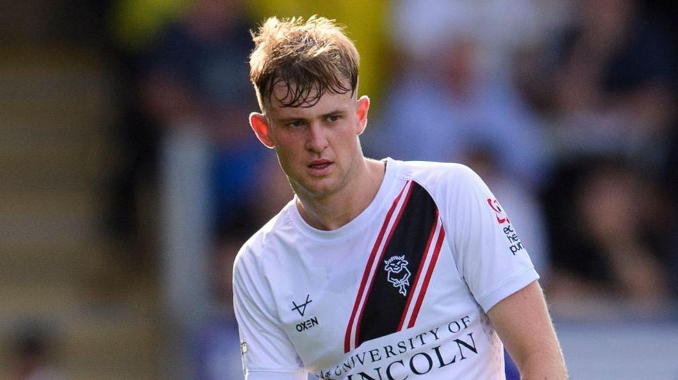 JJ McKiernan: Burton Albion sign Lincoln City midfielder on loan - BBC ...