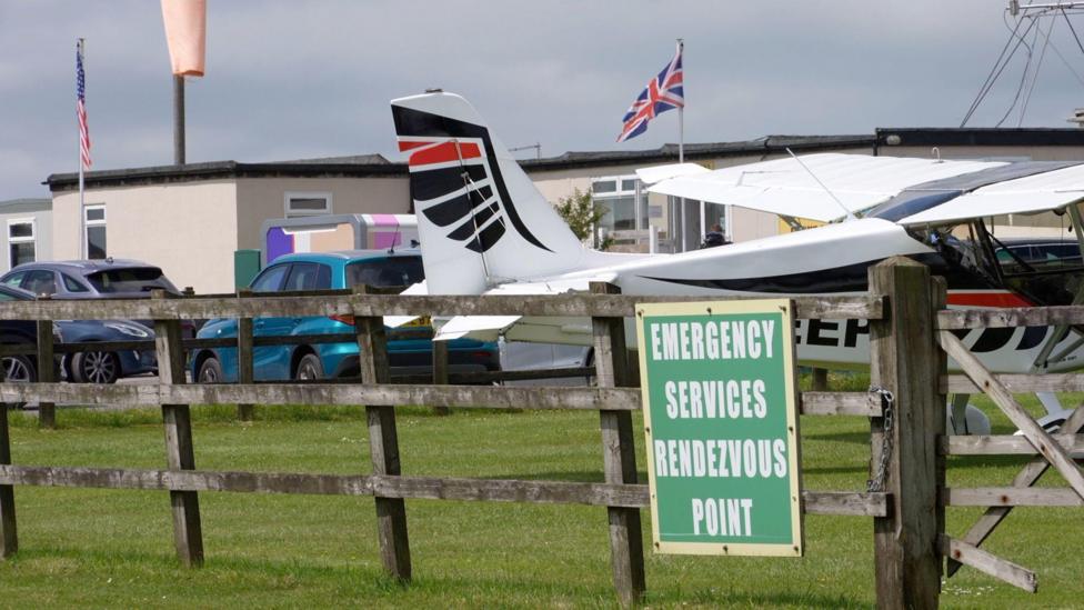 Devon woman who died in tandem skydive was 'caring and giving' - BBC News