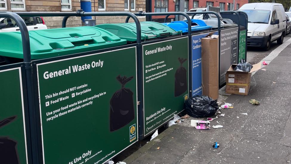 Overflowing bin hubs cause concern for Glasgow residents - BBC News