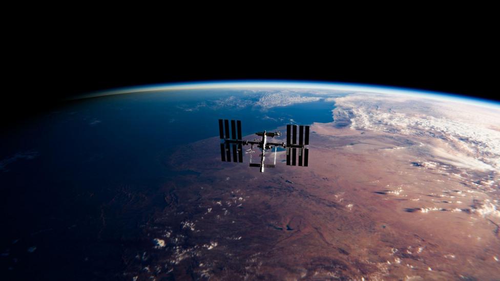 ISS: Astronauts shelter after Russian satellite breaks up - BBC Newsround
