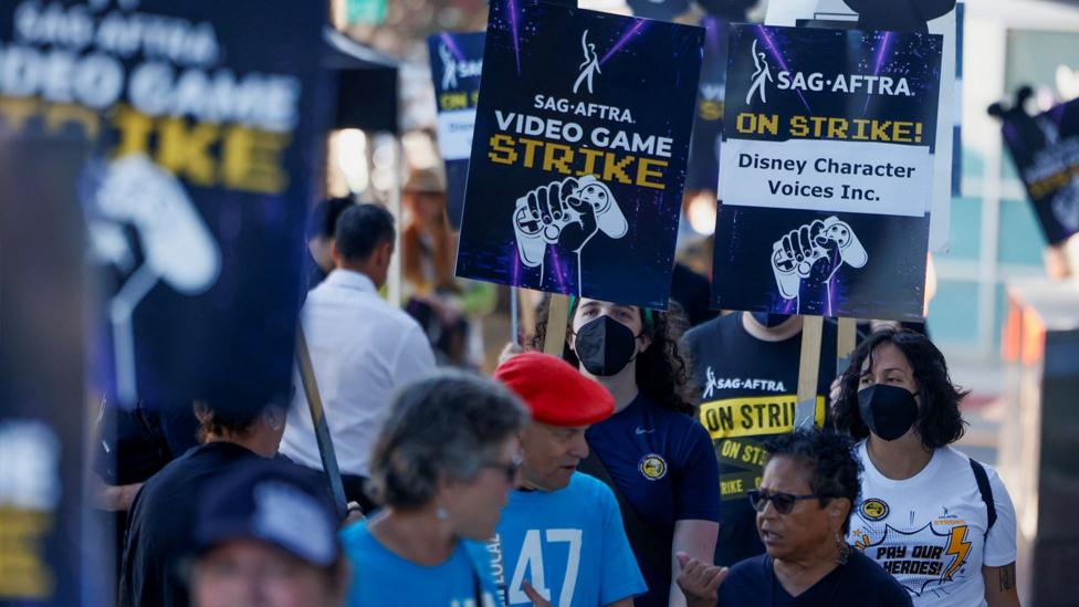 Video game actors strike: Performers protest outside Disney - BBC Newsround