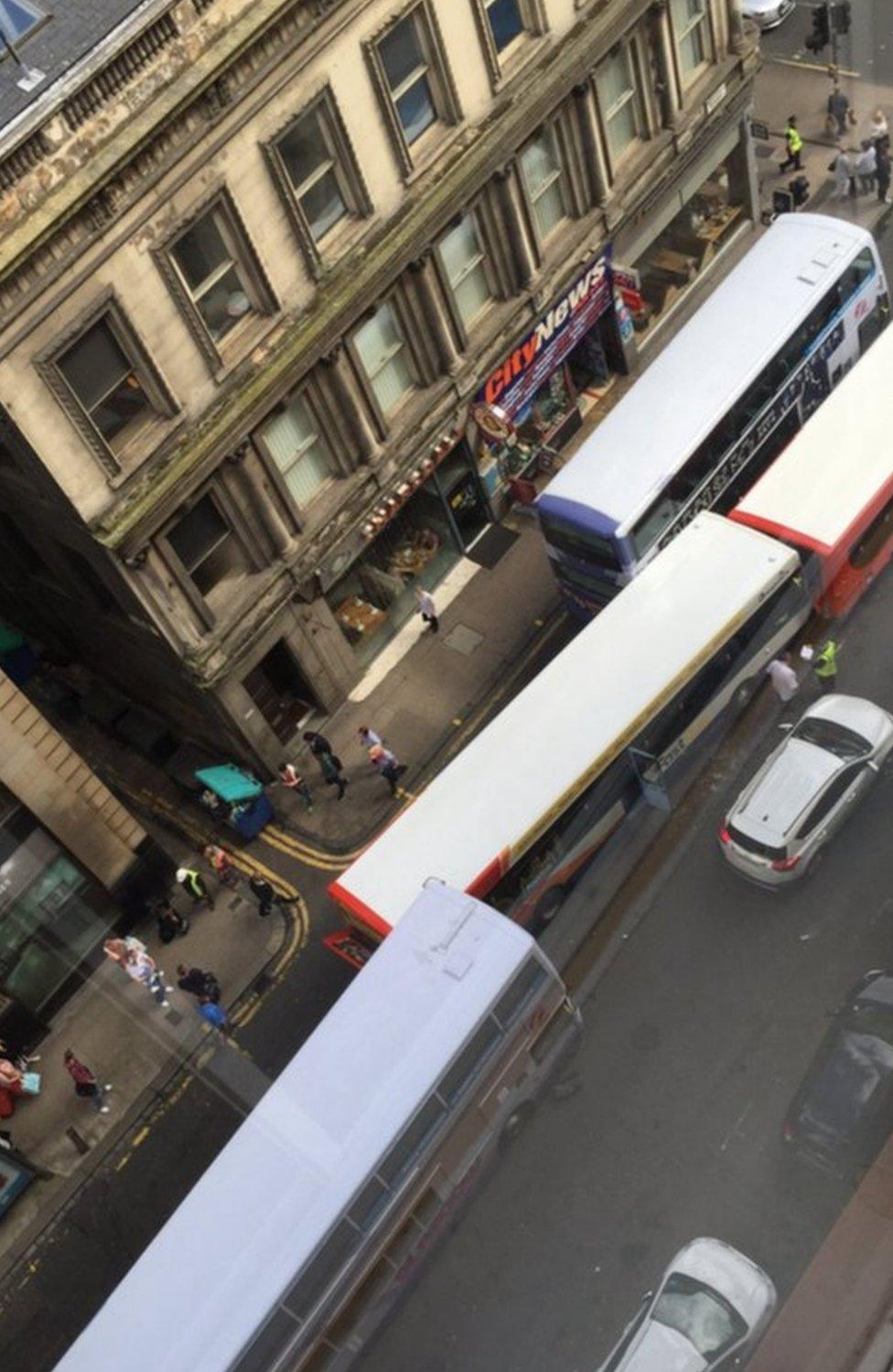 Driver suspended after 'runaway' bus crash in Glasgow - BBC News
