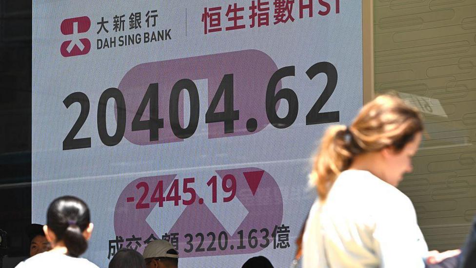Asian stocks see their worst drop in decades after Trump tariffs - BBC News