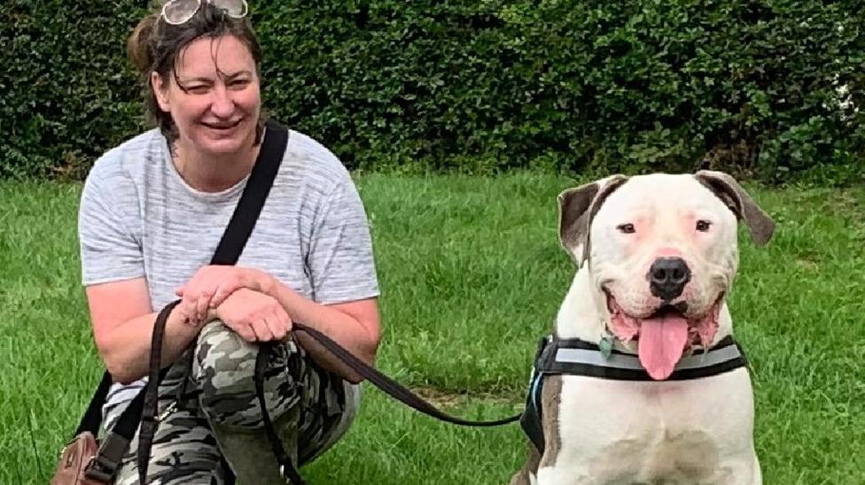 Sussex woman in RSPCA legal row after losing arm in dog attack - BBC News