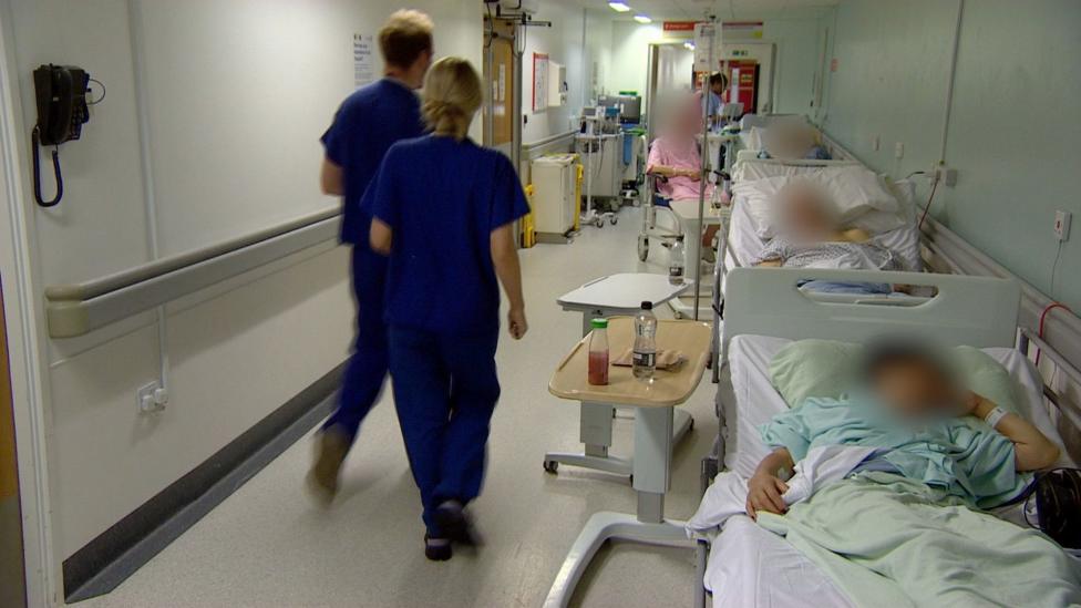 Romford: Patient care in Queen's Hospital corridors 'now normal' - BBC News