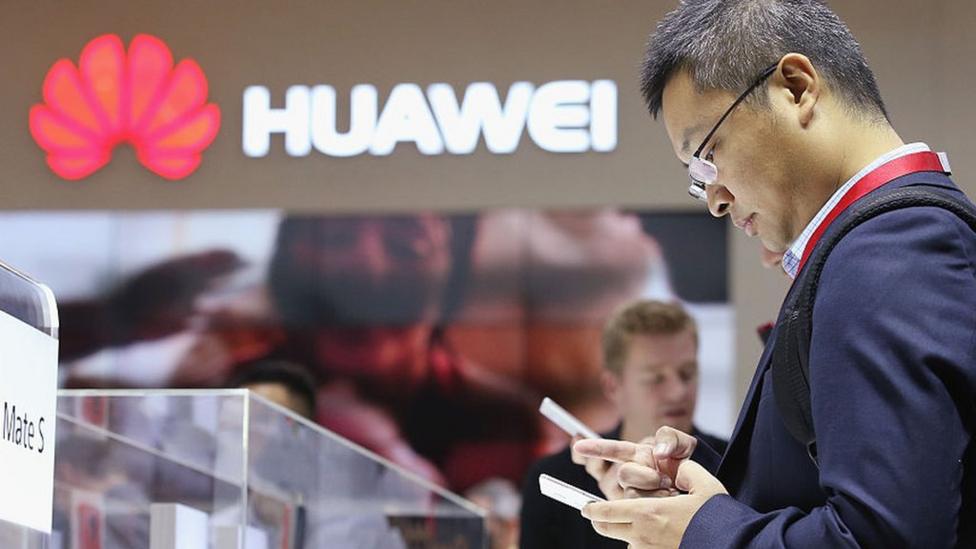 Huawei sees trouble ahead despite revenue rise - BBC News