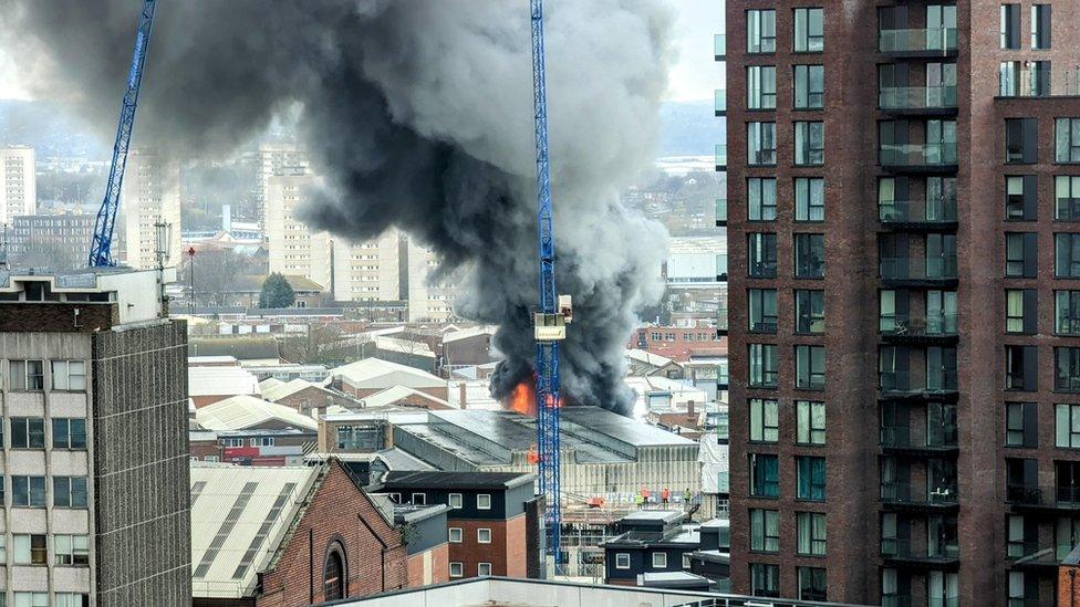 Crews remain at Birmingham warehouse fire - BBC News