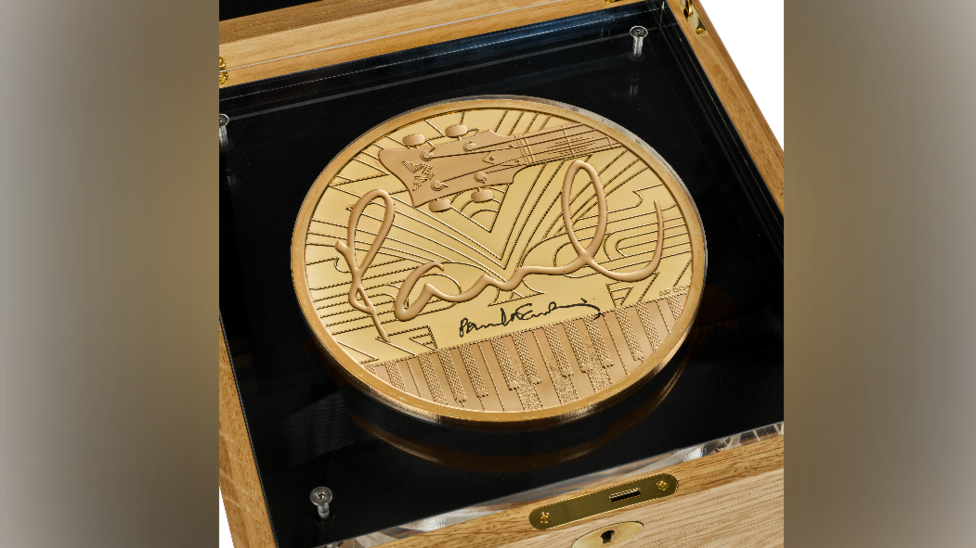Rare Sir Paul McCartney coins go under the hammer - BBC News