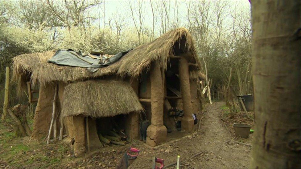 Man told to leave self-built mud hut in London woodland - BBC News