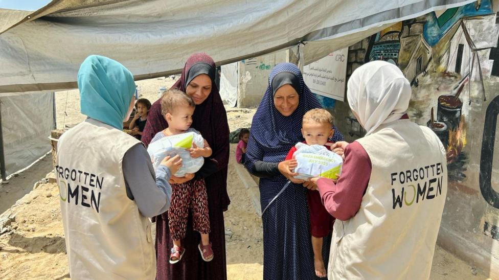 Women's aid charity Forgotten Women organises walks for Gaza - BBC News