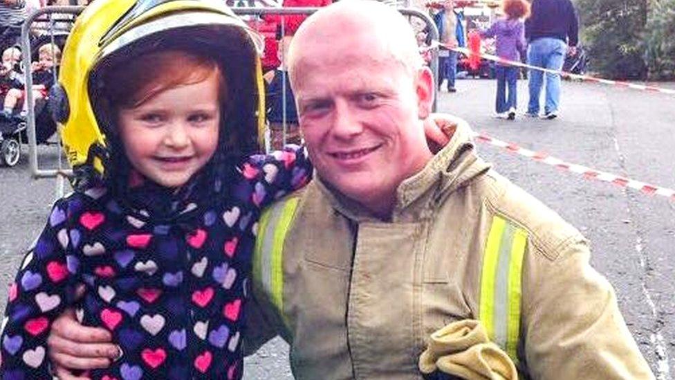 Firefighter gets £1.5m after losing hand in training exercise - BBC News