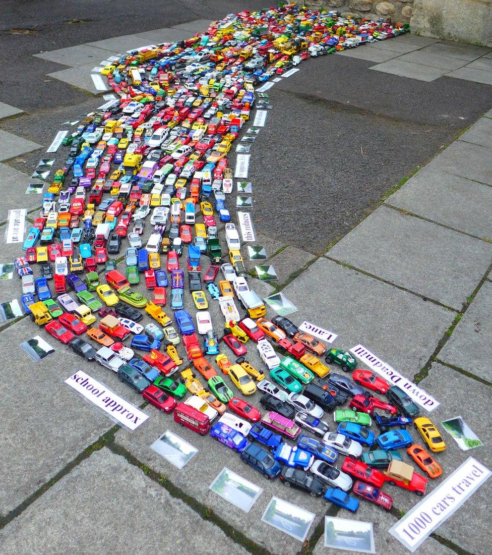 Installation of 25,000 toy cars in bid to reduce school run - BBC News