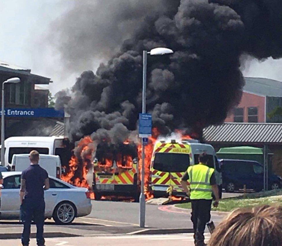 Fire destroys ambulances outside East Surrey Hospital - BBC News