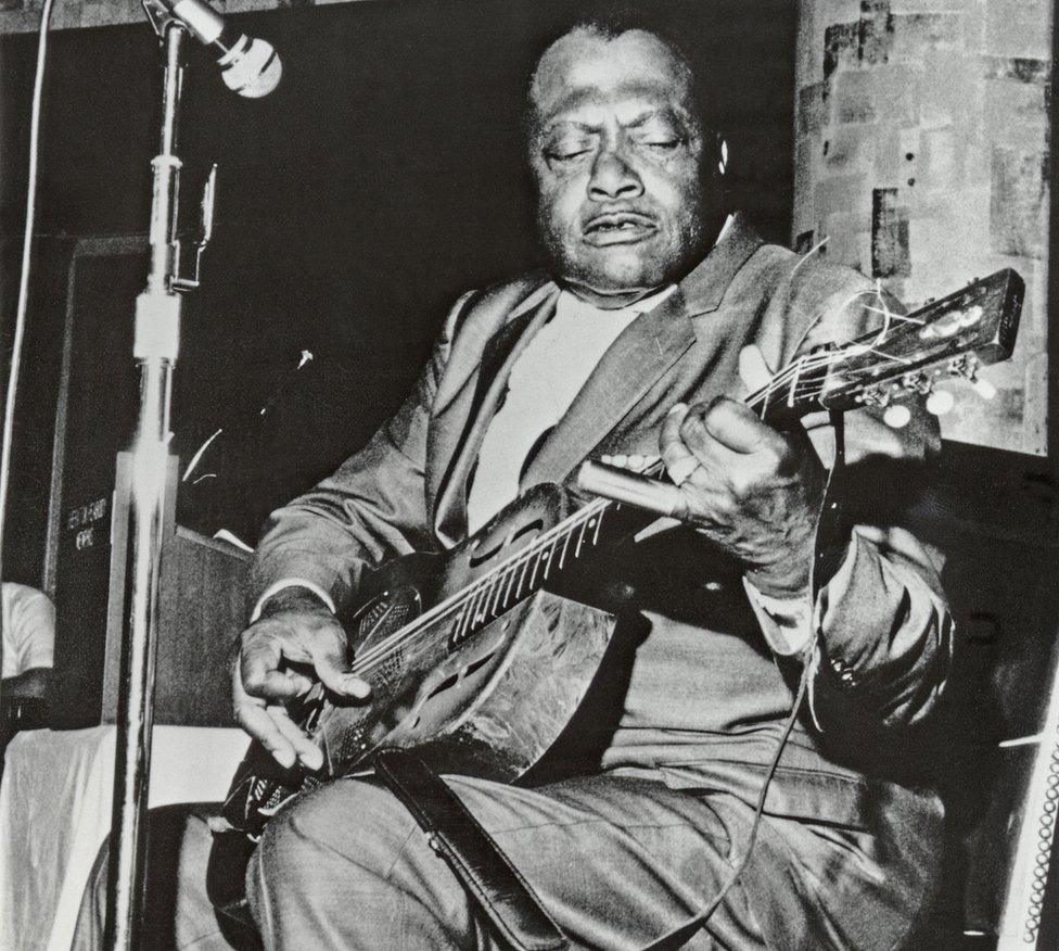 Bukka White's famous vintage guitar sold at auction - BBC News