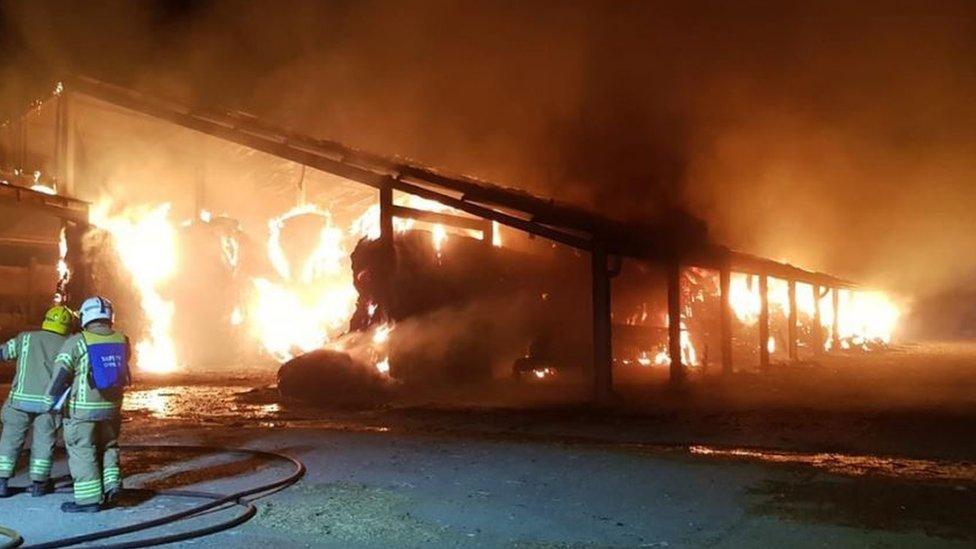 Arson probe after fire rips through barn in Marnhull - BBC News