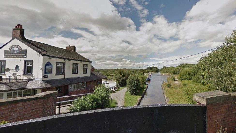 Body of man in his early 50s found in canal in Wigan - BBC News