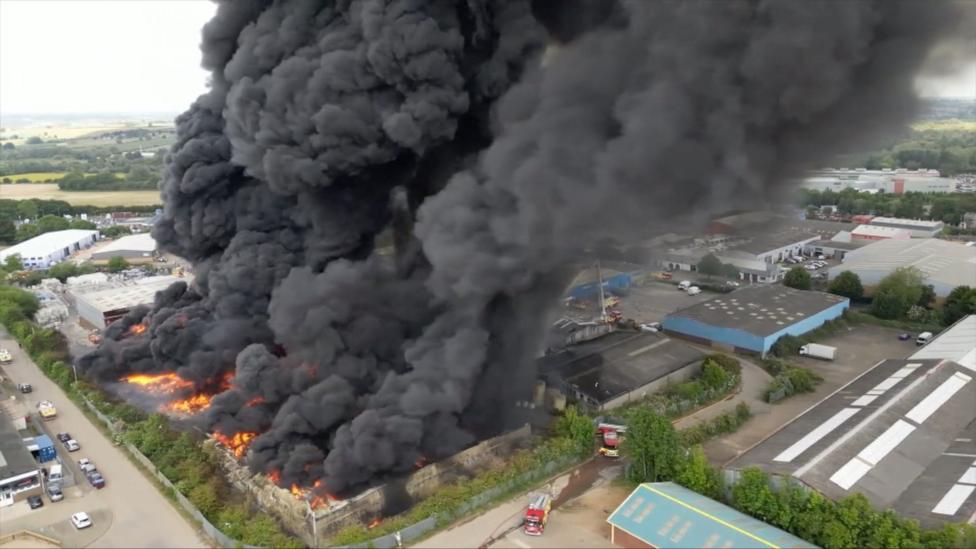 Rushden industrial estate reopens after recycling site fire - BBC News