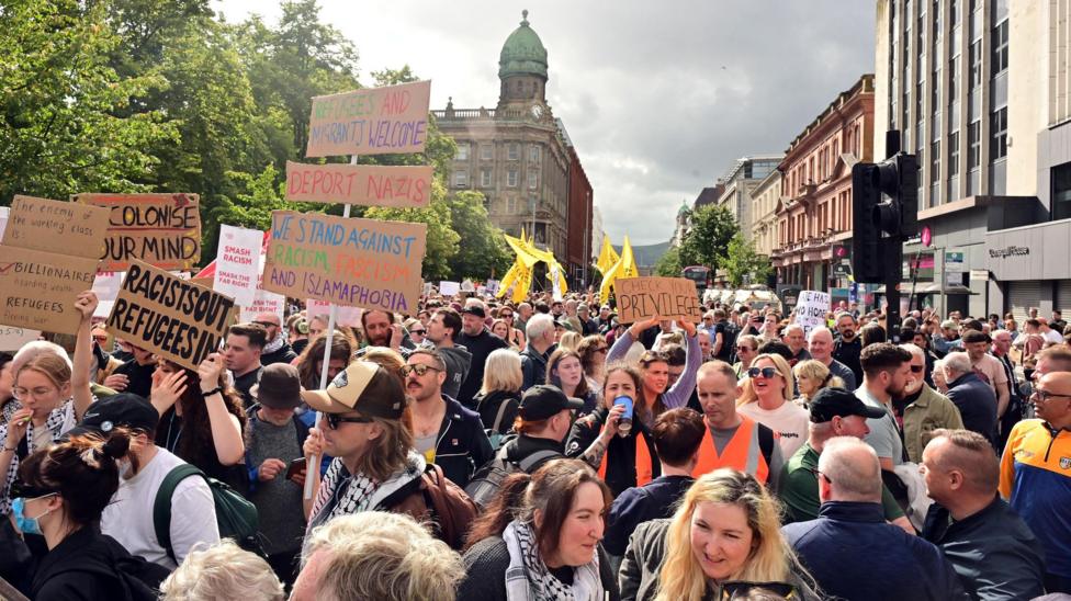 Belfast: Anti-racism protesters rally in city centre - BBC News