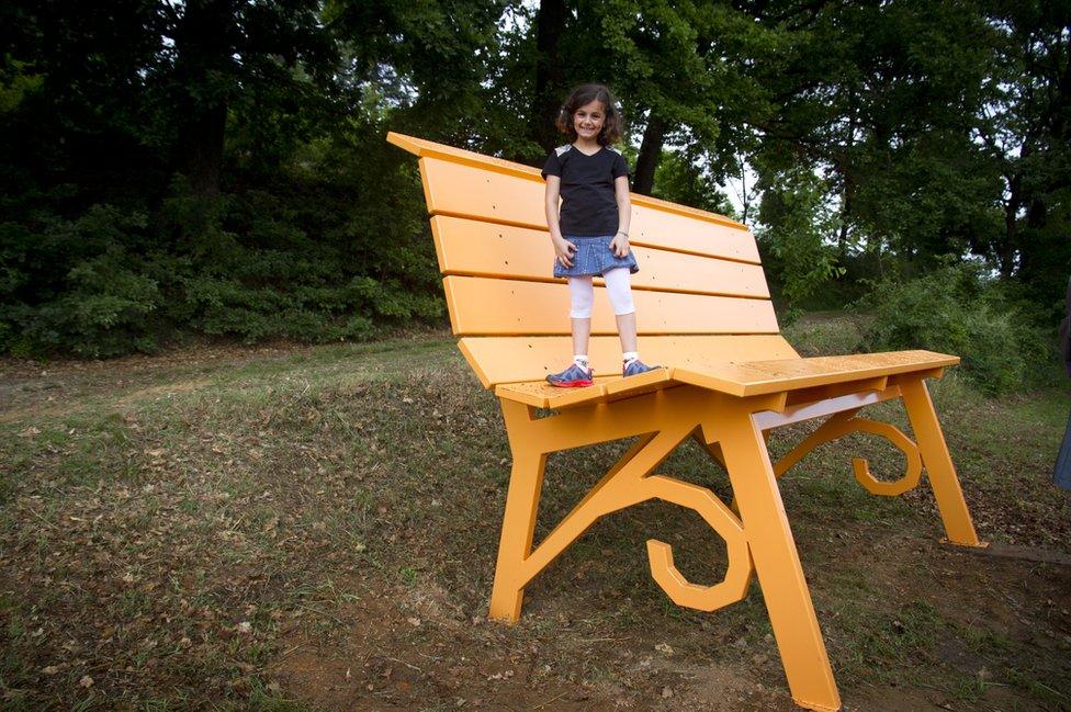 The giant benches that make adults feel like children - BBC News