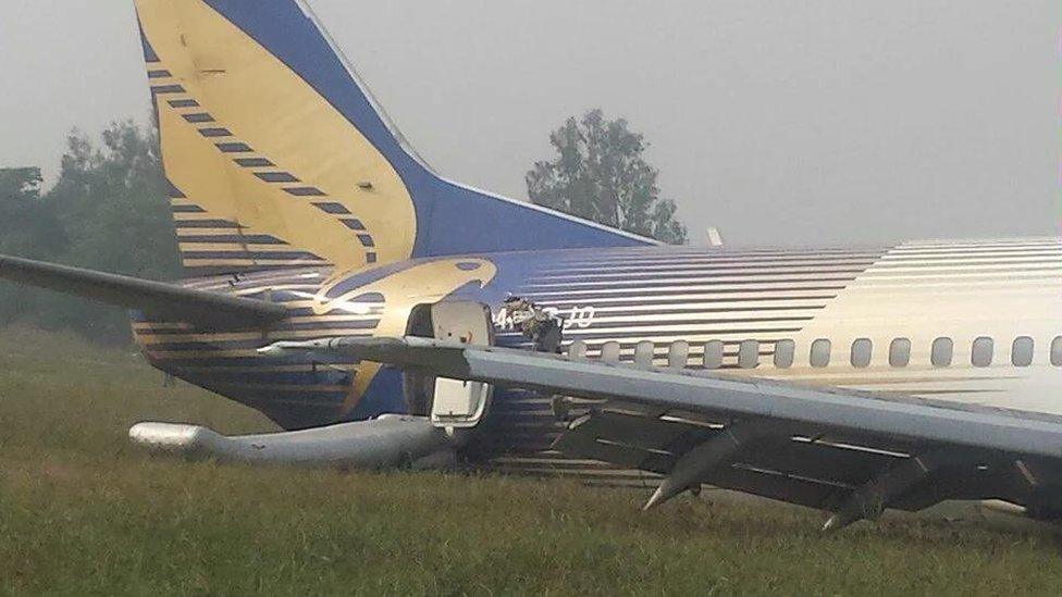 Pakistan Shaheen Air plane careers off runway - BBC News