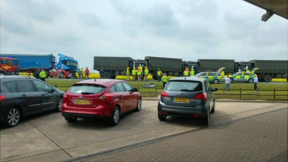 Five lorry drivers hurt in A17 military truck crash - BBC News
