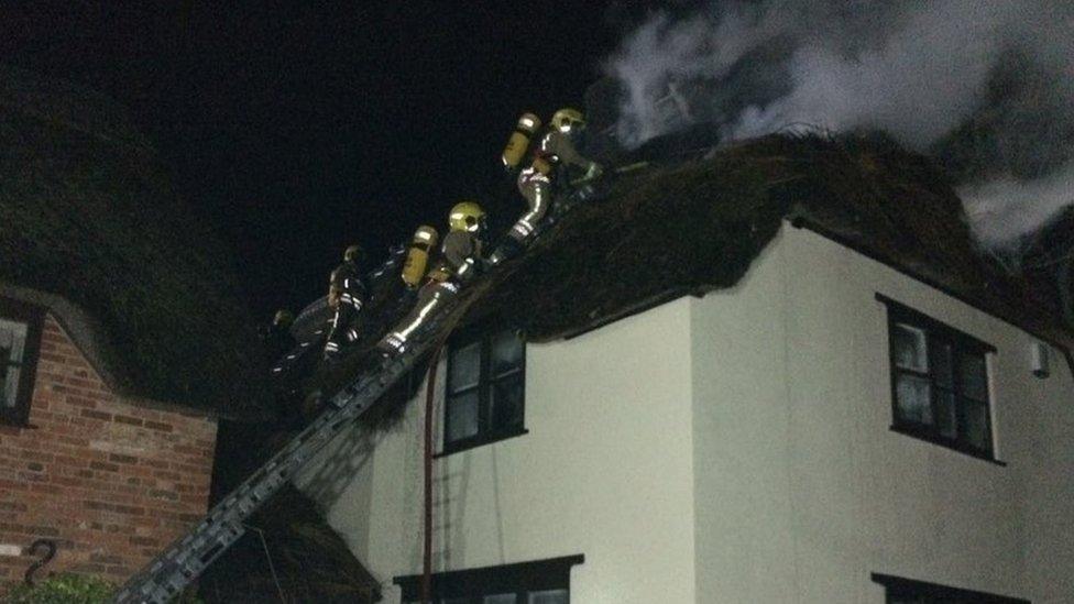 Fire crews tackle Lytchett Matravers thatch fire - BBC News