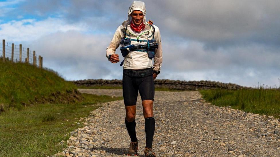 GP with diabetes sends message after endurance race win - BBC News