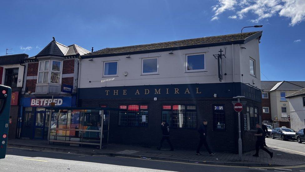Cardiff: Man charged with rape outside pub - BBC News