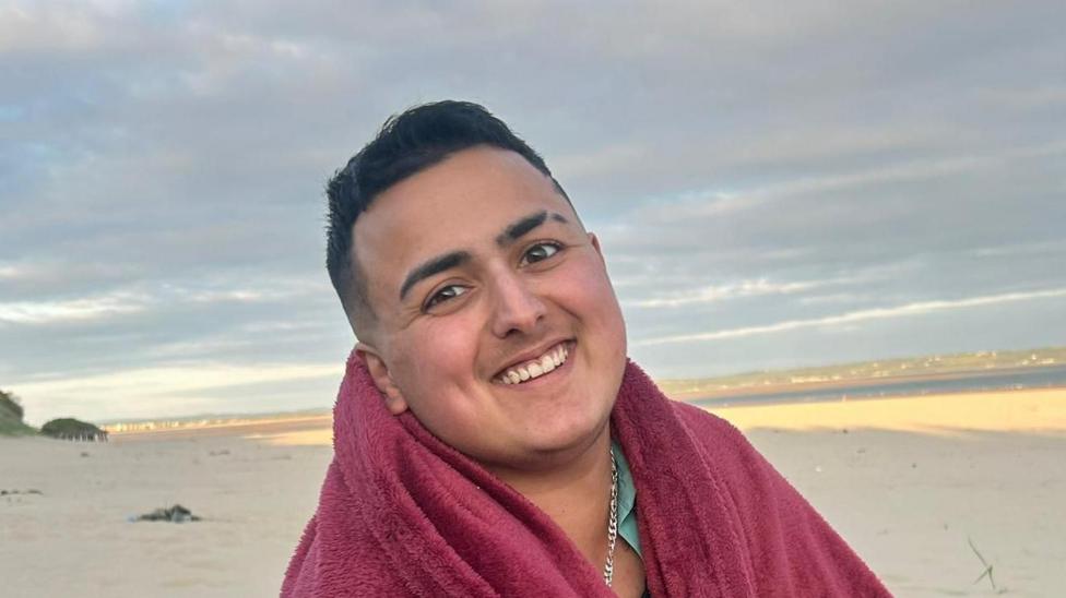LGBT: Llanelli trans man says he locked himself away over period - BBC News
