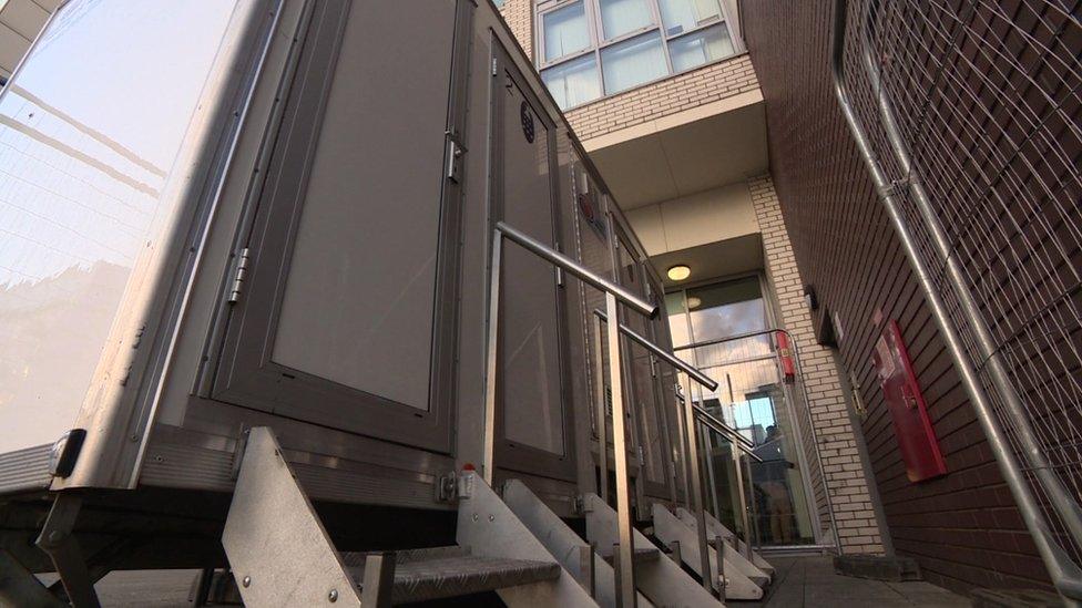 Residents forced to shower outside 'humiliated' - BBC News