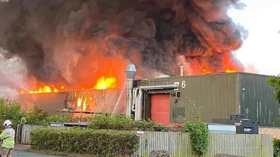 Redditch factory destroyed in fire involving propane cylinders - BBC News
