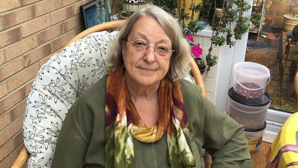 Woman left 'trapped in own home' waiting for knee surgery - BBC News