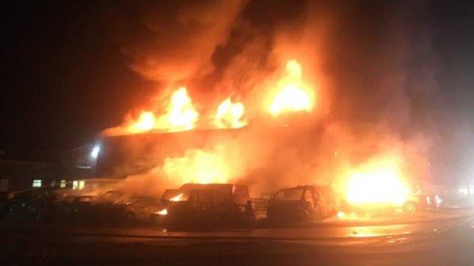 Cardboard fire 'destroys cars and workshop' in Hixon - BBC News