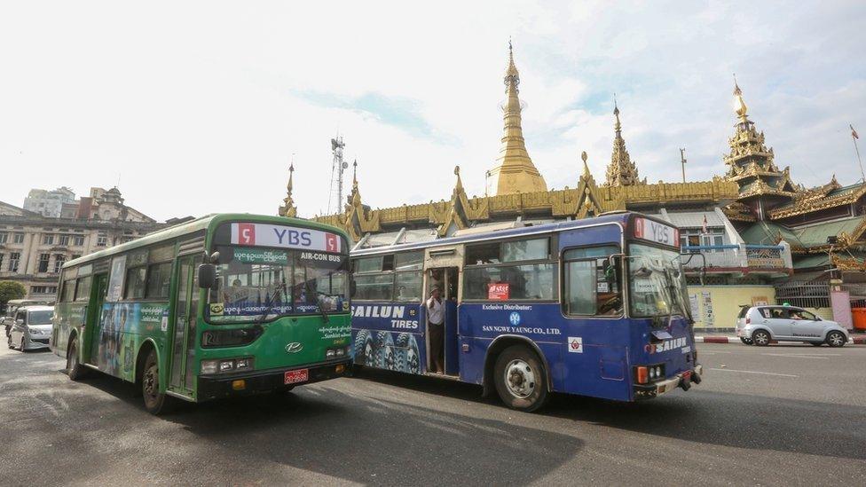 In pictures: A day riding on Yangon's new bus system - BBC News