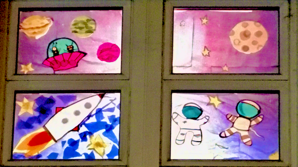Window artwork display showcases Oxford community's creations - BBC News