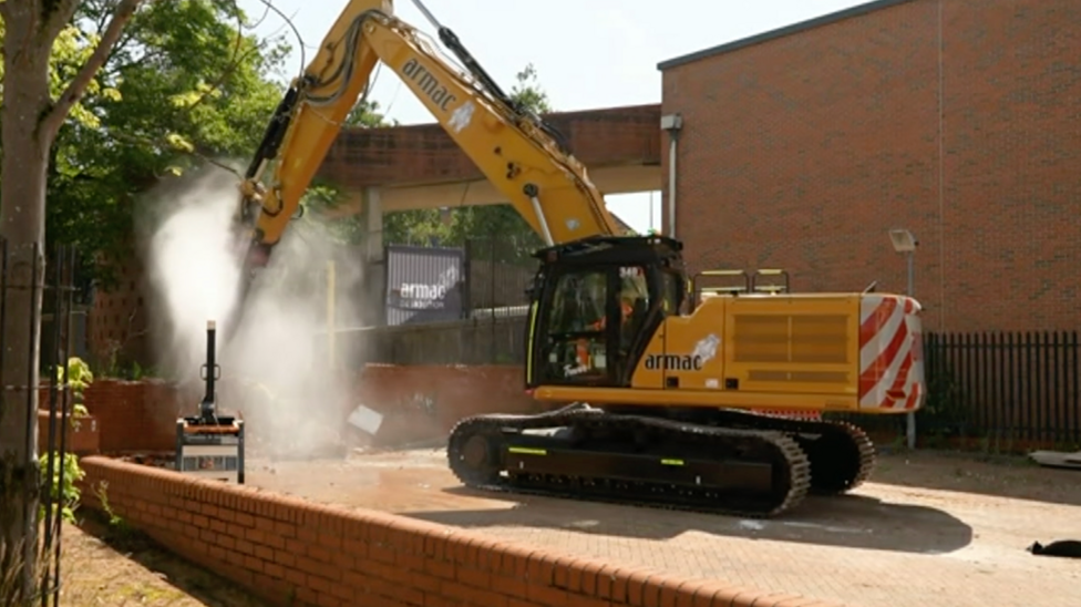 Coventry arcade demolition starts as City Centre South begins - BBC News