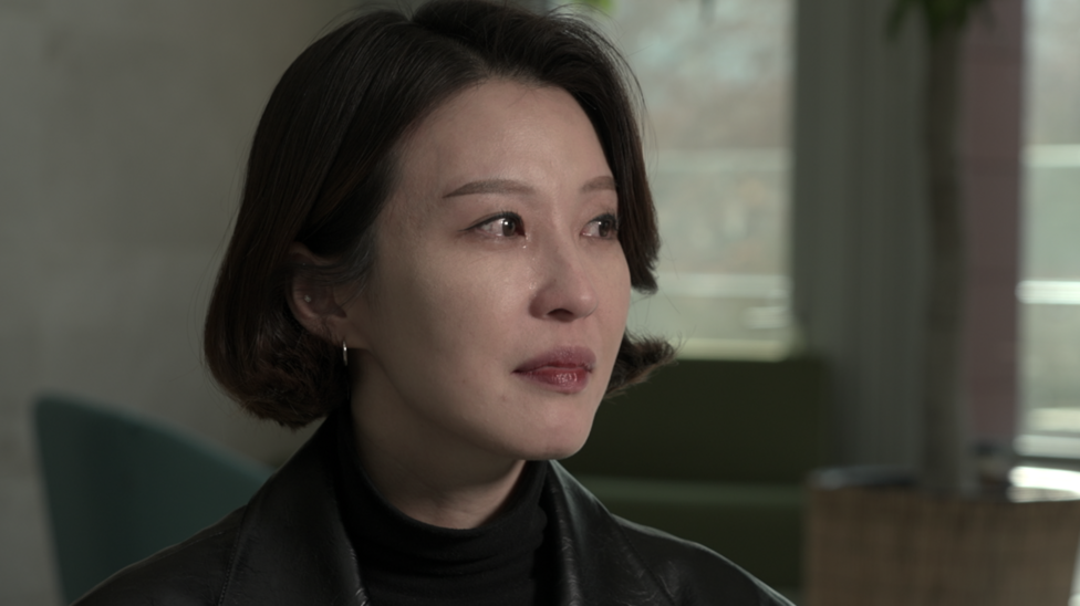 South Korea martial law: Fearless woman grabs soldier's gun - BBC News