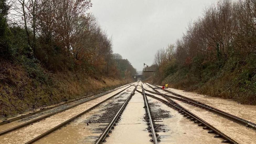 Train line between Barrow and Lancaster reopens after repairs - BBC News
