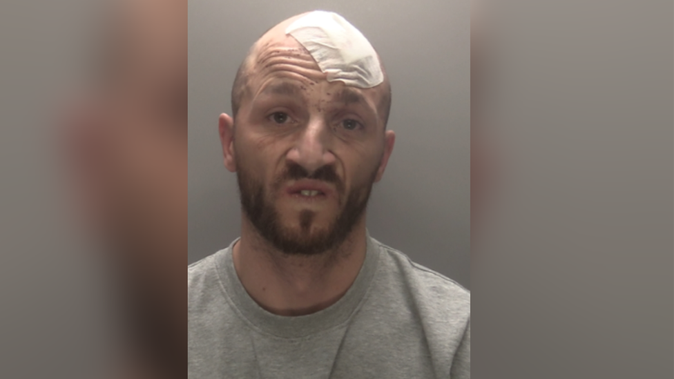 Man who stamped on Leicester taxi driver's head jailed - BBC News