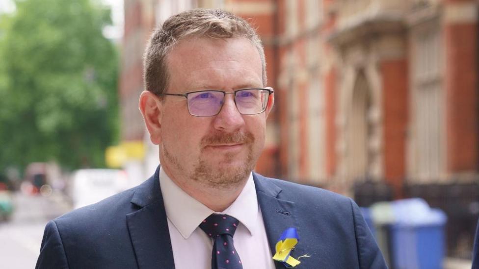 Minister sacked over WhatsApp messages faces standards probe - BBC News