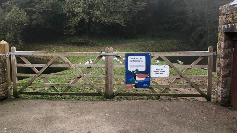 Appeal launched after signs taken from resevoir - BBC News