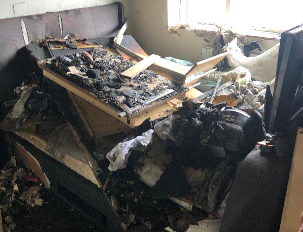 Crawley neighbours step in after fire guts family home - BBC News